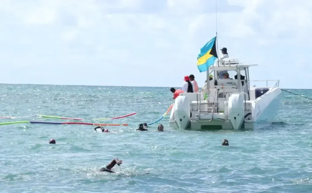 Swimmers brave rainy weather at 52nd Bernie Butler Open Water Swim in ...