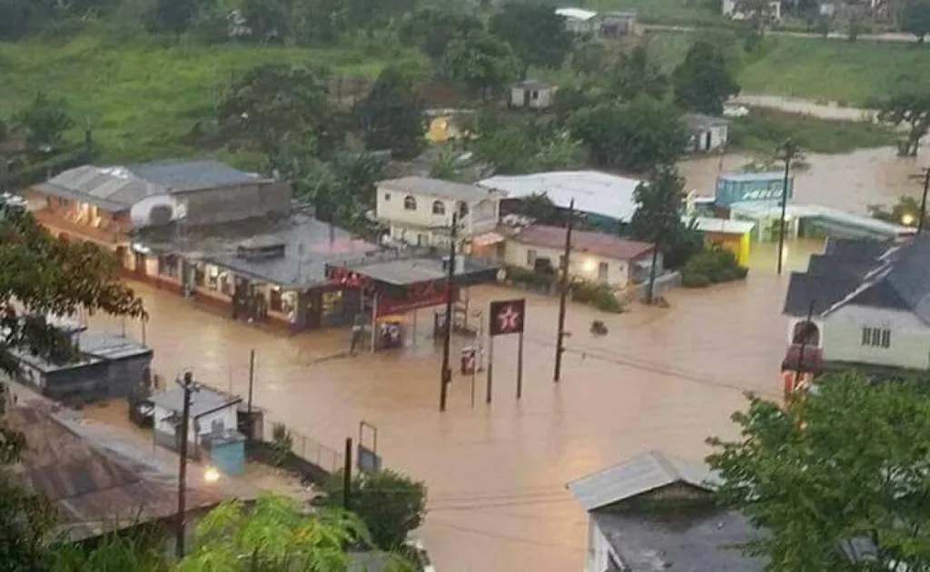 Communities counting the costs after floods in Jamaica - WIC News